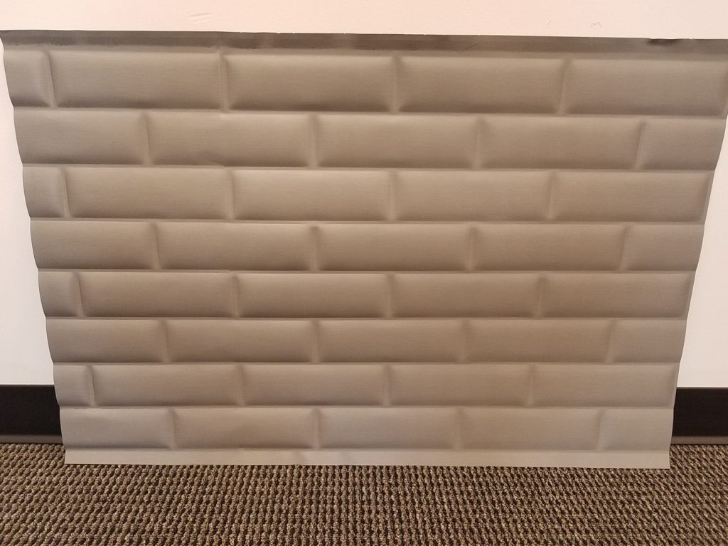 embossed brick layout metal panels | Spengler Industries