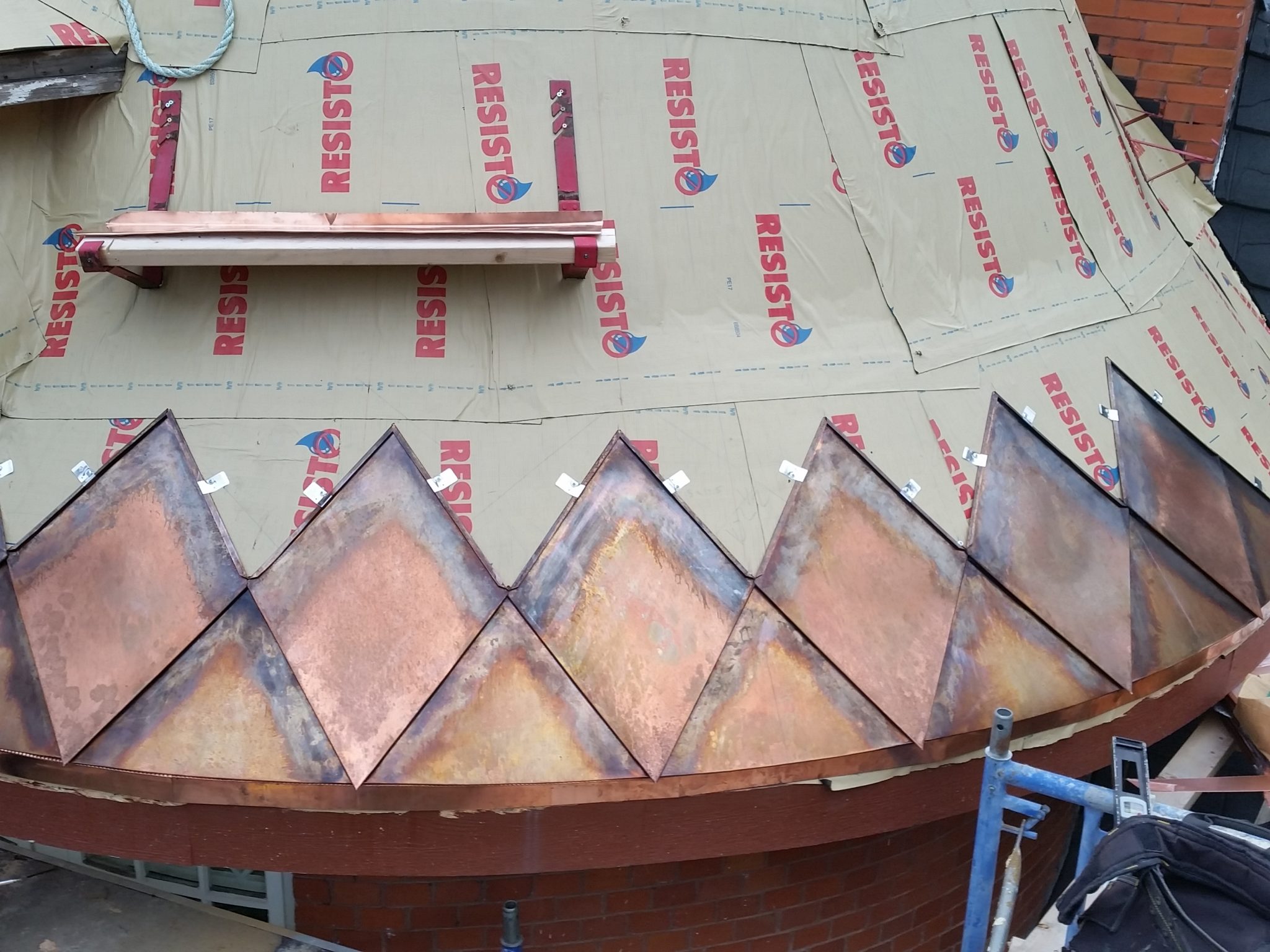 Copper shingles on turret with dormer - Spengler Industries