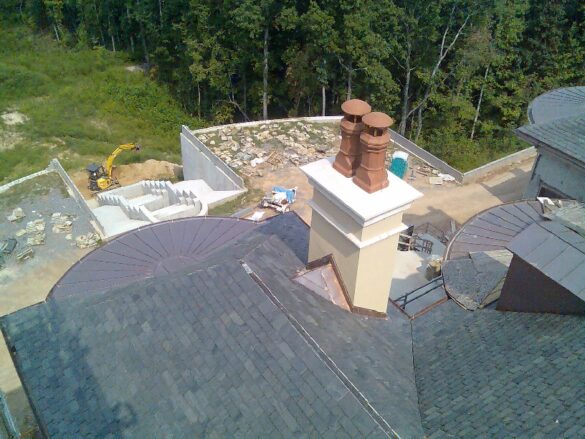 Slate-roof-with-radius-copper-details | Spengler Industries