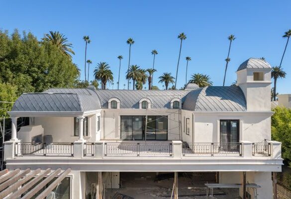 Copper shingles on turret with dormer | Spengler Industries