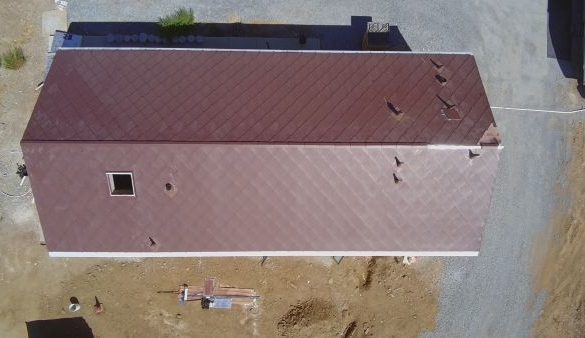 Copper shingles on turret with dormer | Spengler Industries